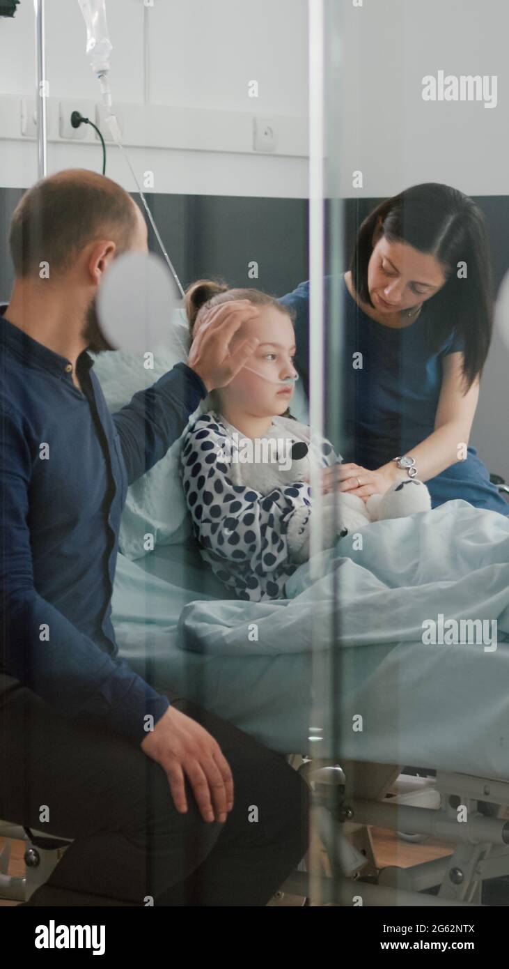 Worried family in hospital waiting room hi-res stock photography and ...