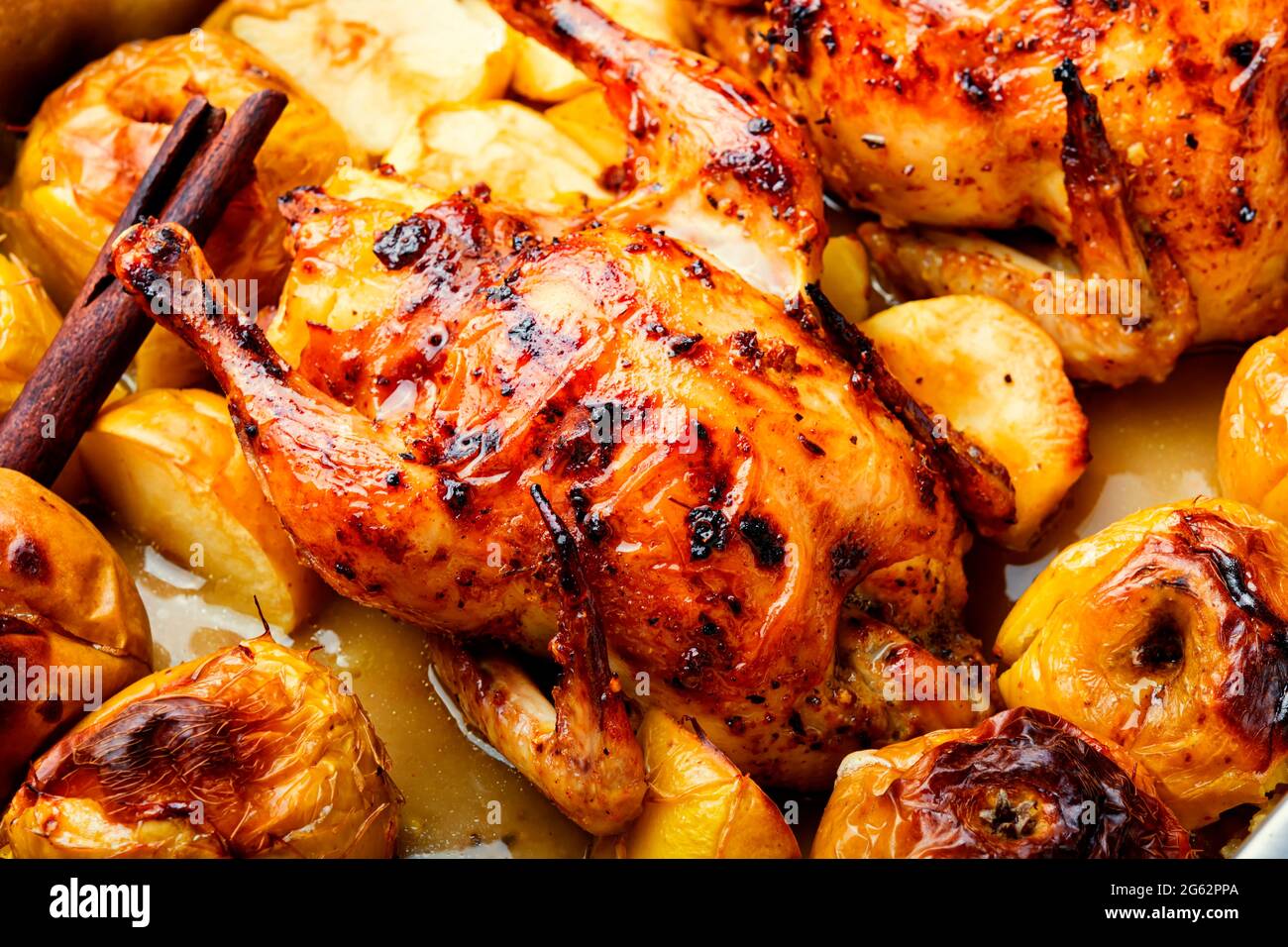 Delicious homemade chicken baked in a tray. Partridge roasted in spices ...