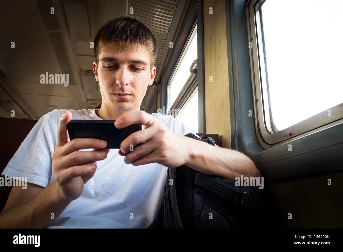 Teen mobile train hi-res stock photography and images - Alamy