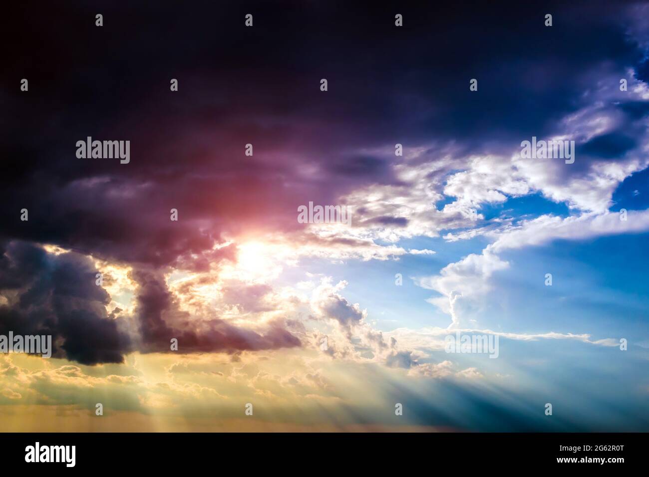 Red Sunlight in the Dark and Dramatic Storm Clouds Stock Photo - Alamy