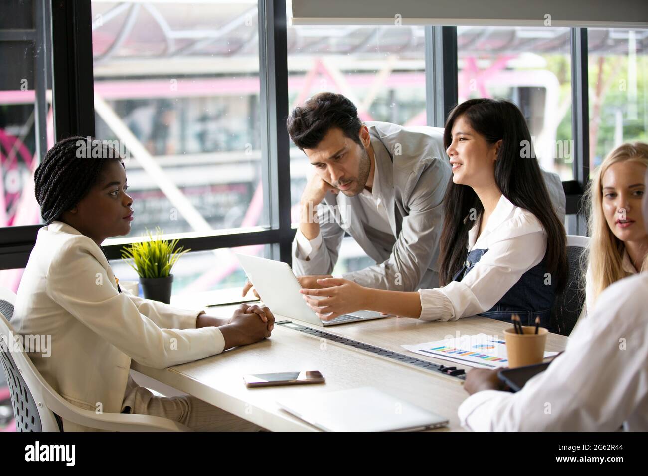 business people working together in office Stock Photo - Alamy
