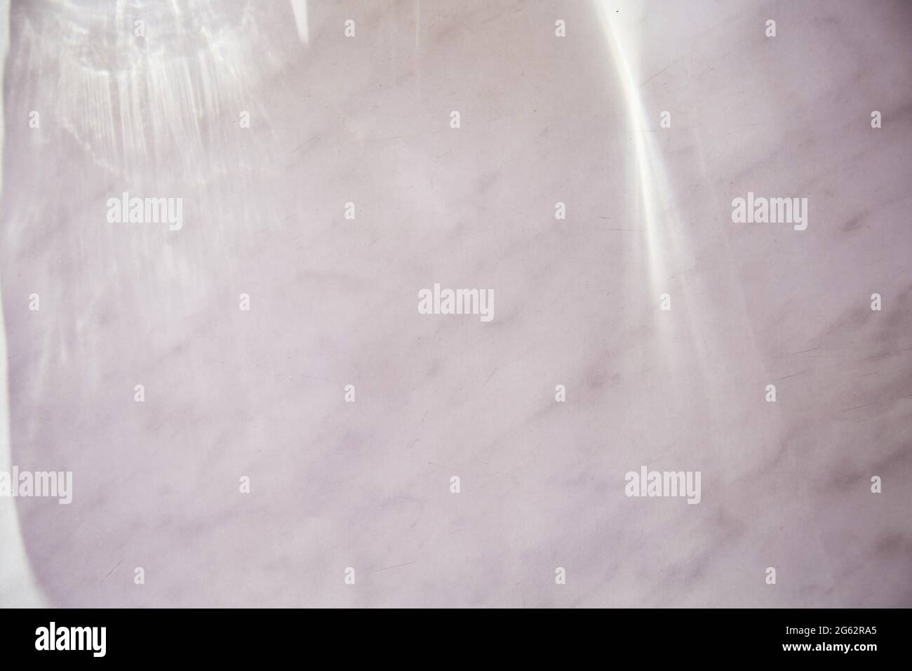 Trendy delicate background with natural sunbeam on marble surface ...