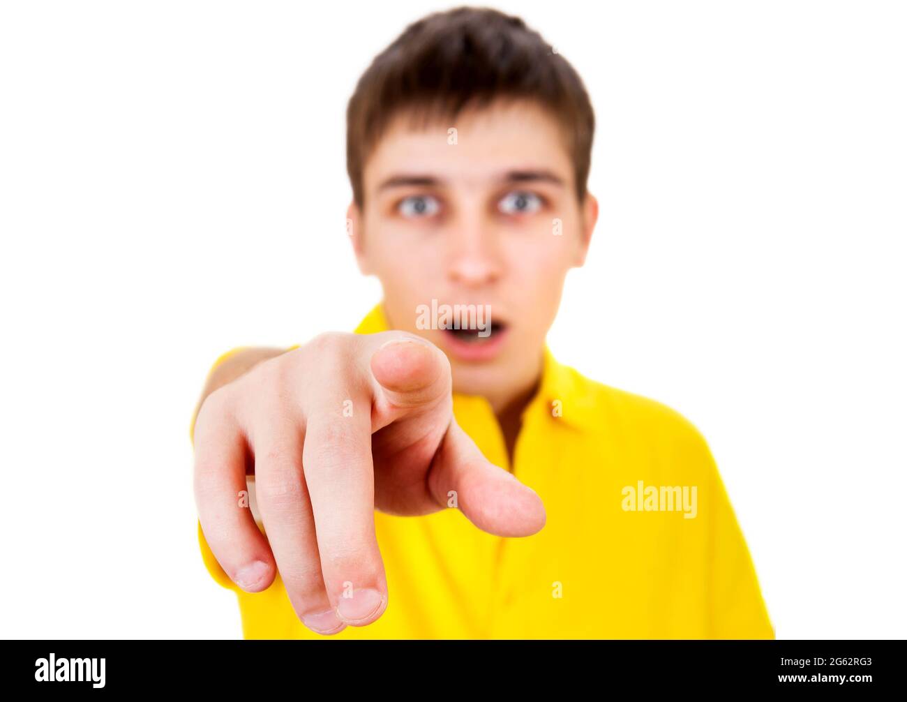 Surprised young man pointing hi-res stock photography and images - Alamy