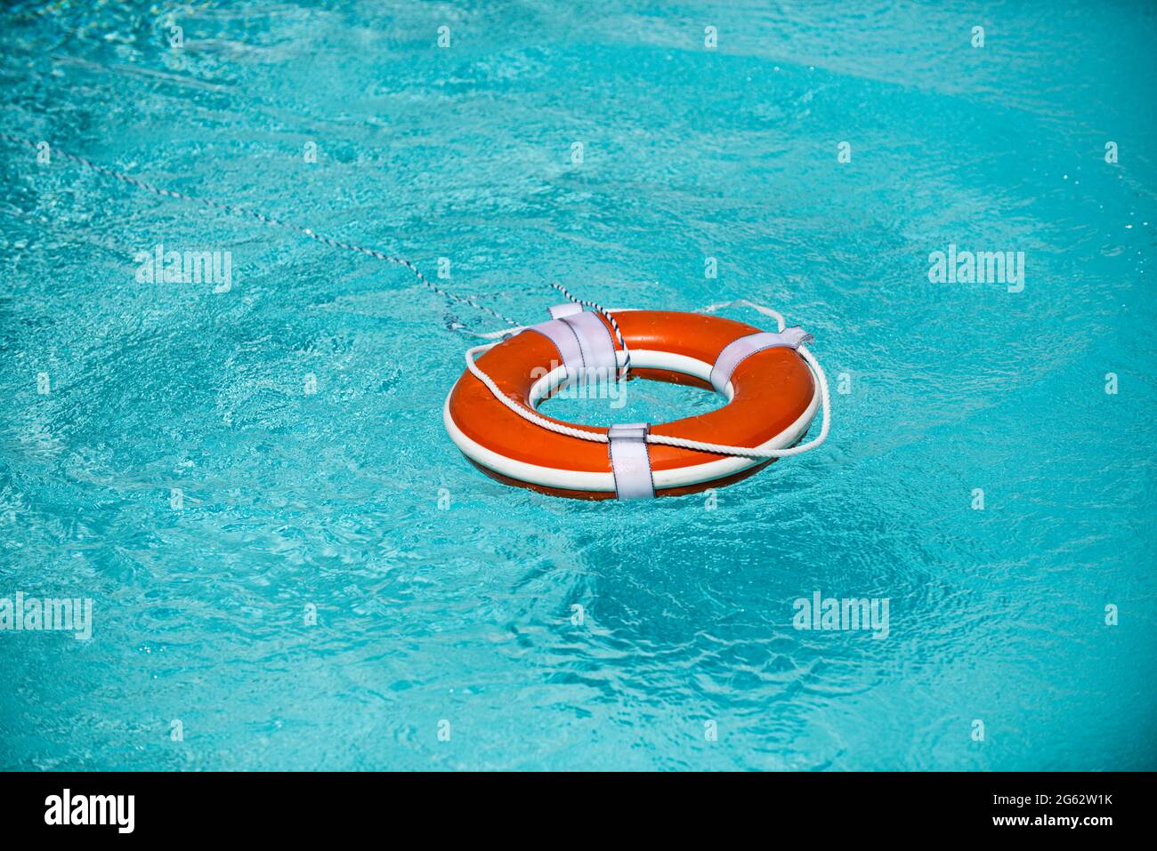 Lifebuoy on the water background. The concept of help, rescue, drowning ...
