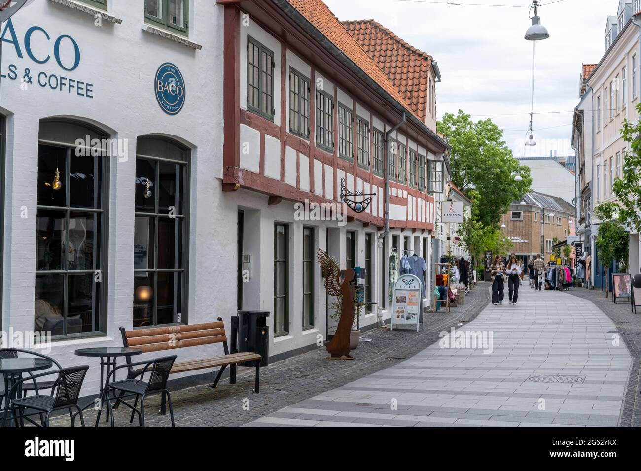 Aalborg, Denmark - 7 June, 2021:t he high street in Aalborg with many ...