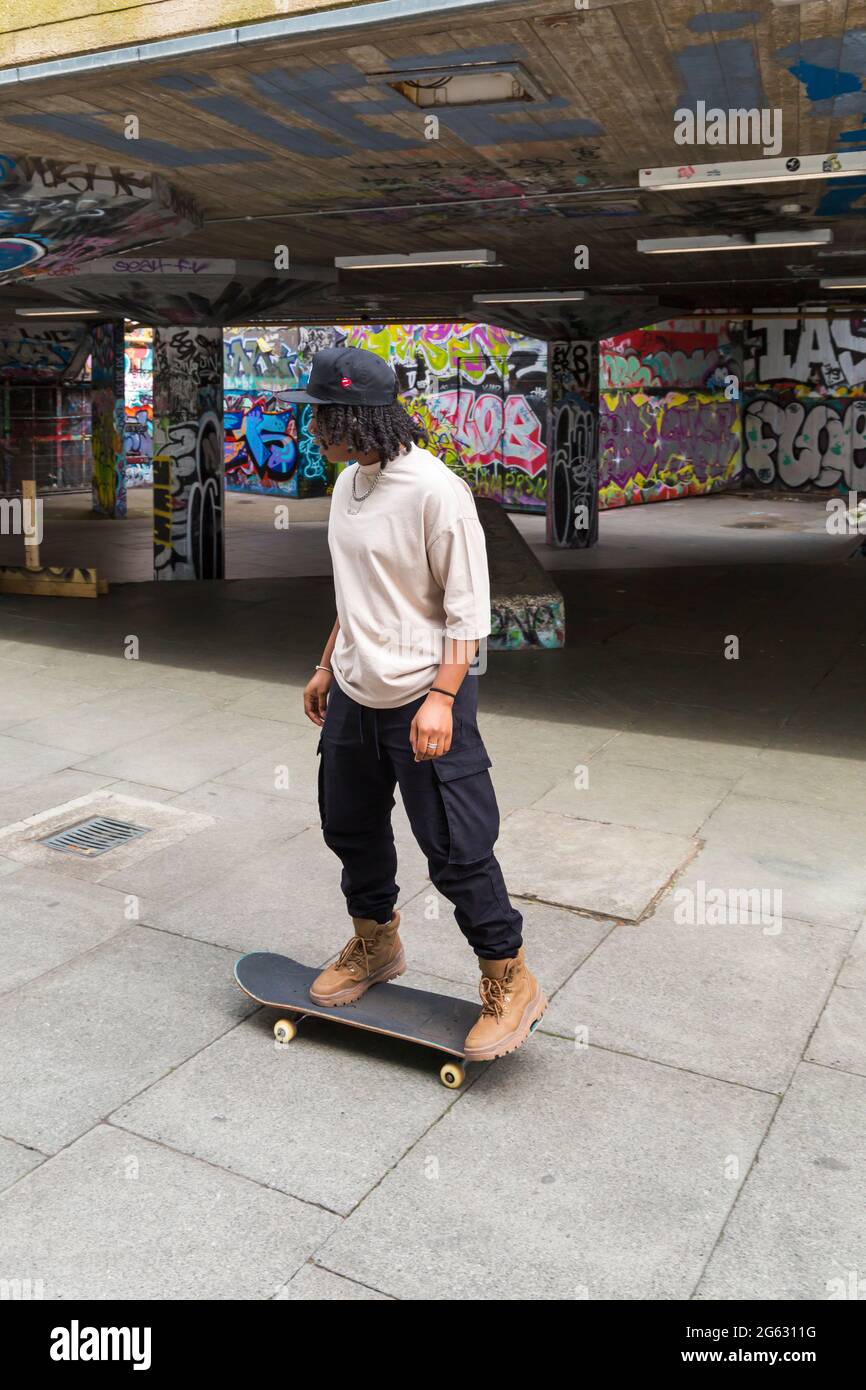 Skateboarder skateboarding at Southbank Skatepark, South Bank, London ...