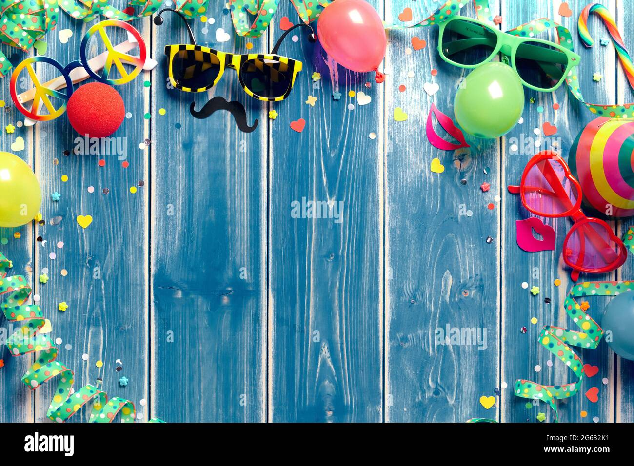 Festive background with multicolored party glasses and colorful ...