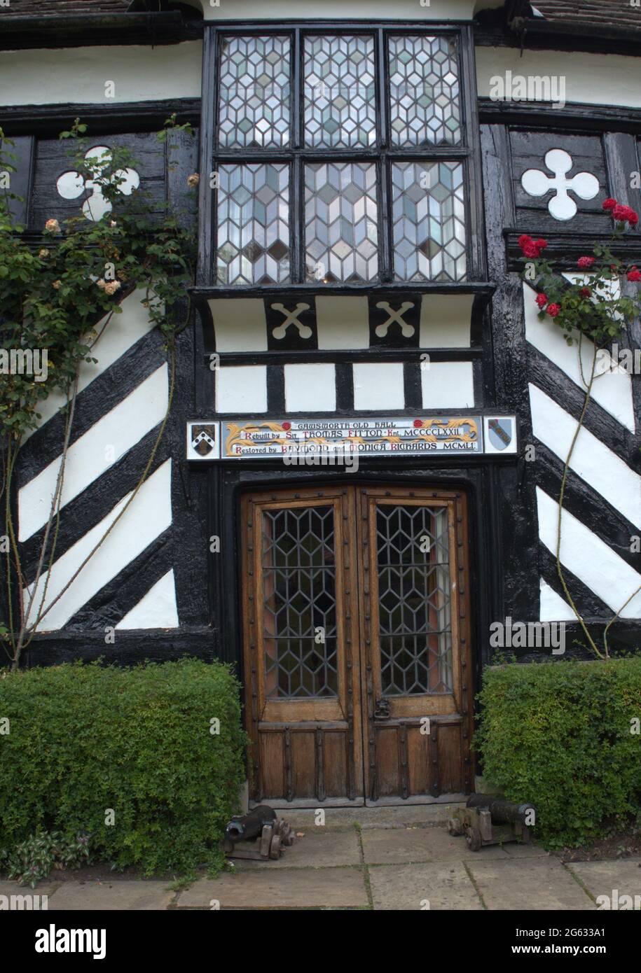 Entrance to Gawsworth hall featuring the historic plaque above the ...