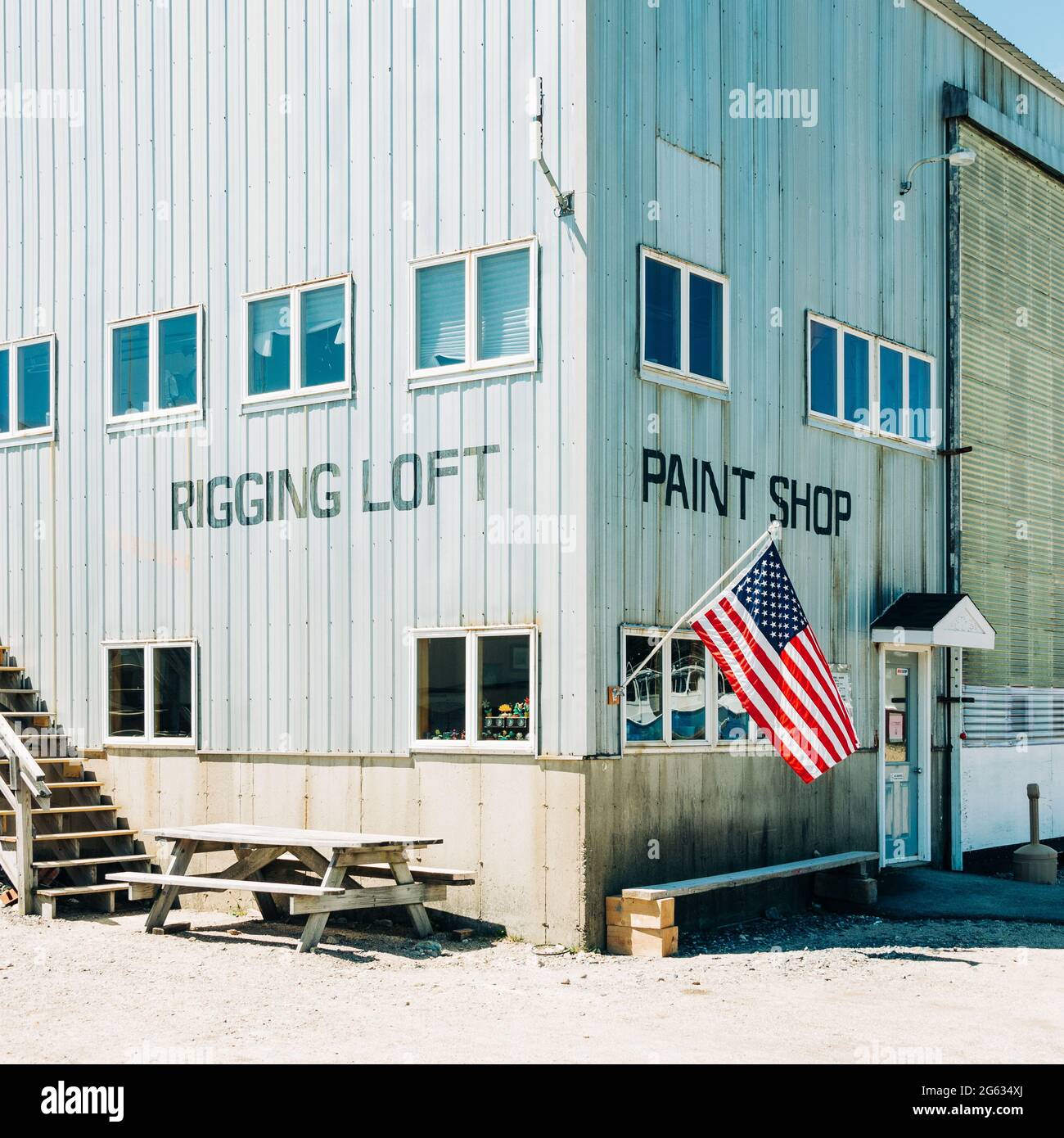 Rigging Loft and Paint Shop signs on a building in the harbor of ...