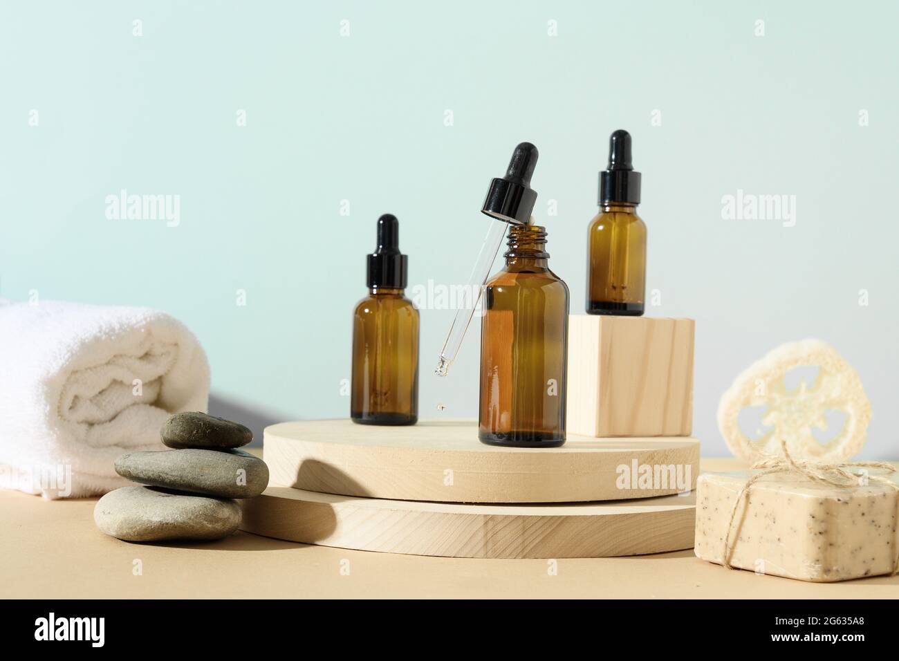 Minimal modern natural composition with cosmetic oil in bottles ...