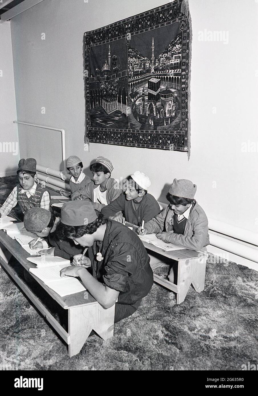 Children reading the Koran, mosque, Forest Fields, Nottingham UK 1985 ...