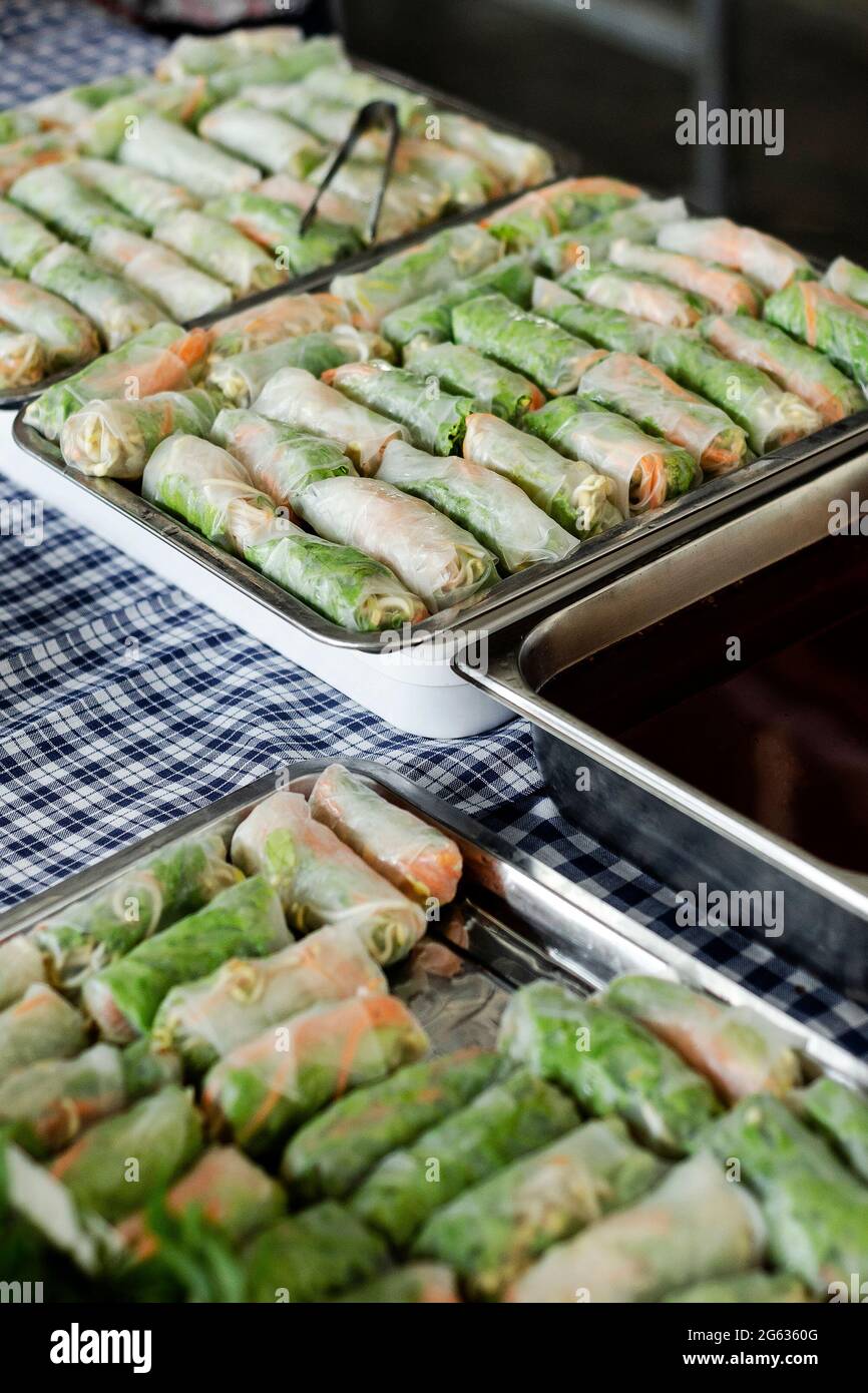 many fresh thai spring rolls in tray on buffet table at function Stock ...