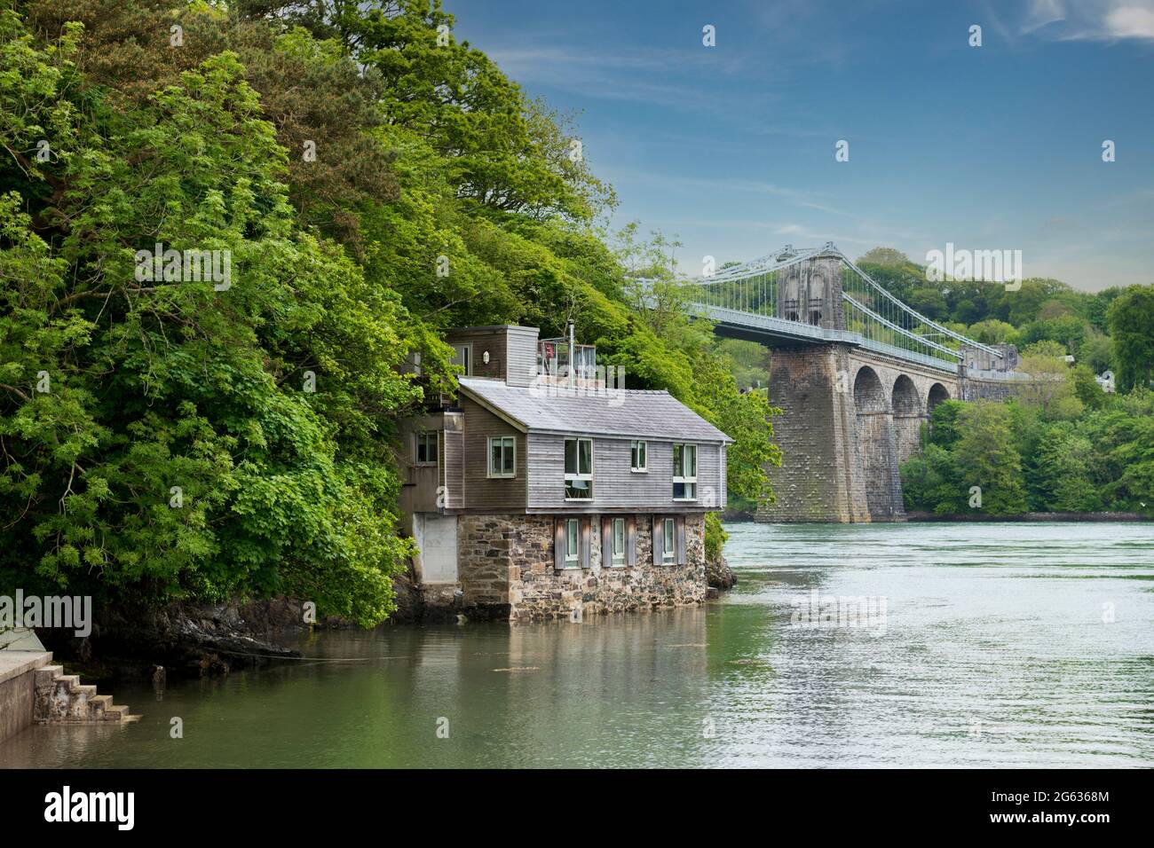 Historic Menai suspension bridge spanning the Menai Straits, Wales UK ...