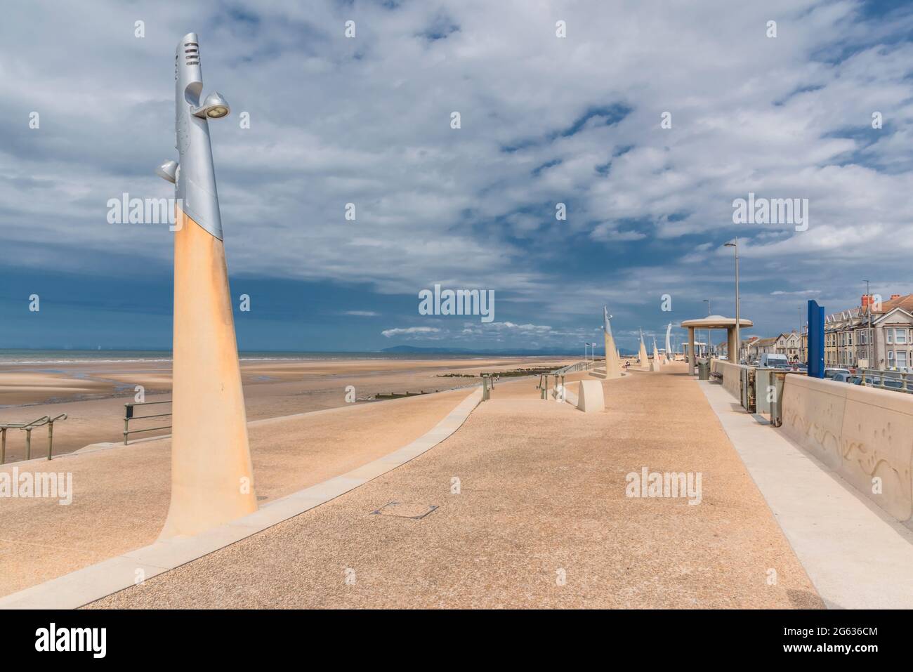 The image is of the seafront promenade with impressive lighting columns ...