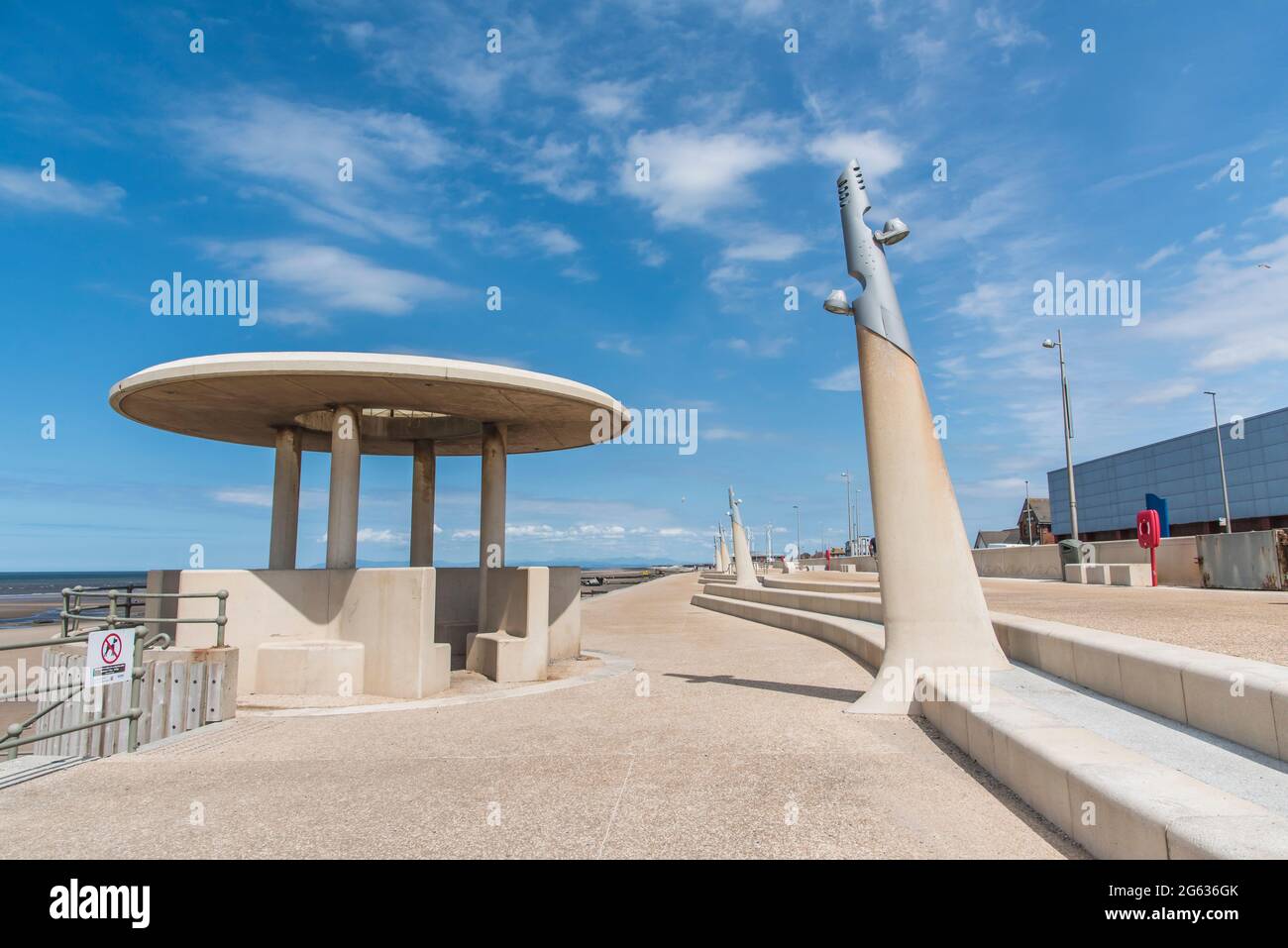 The image is of the seafront promenade with impressive lighting columns ...