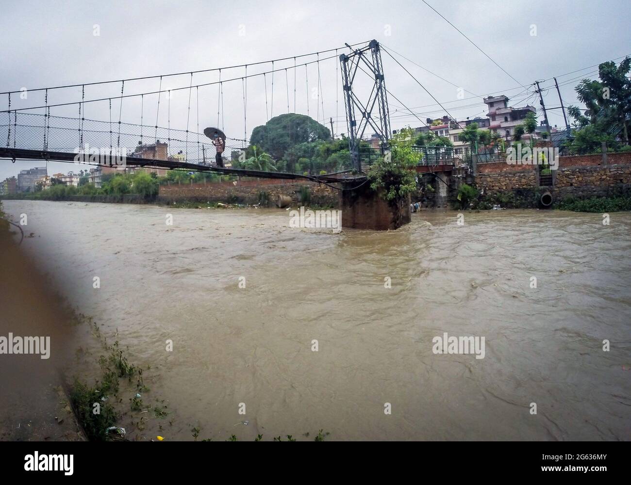 Kathmandu, Bagmati, Nepal. 2nd July, 2021. A pedestrian crosses the ...
