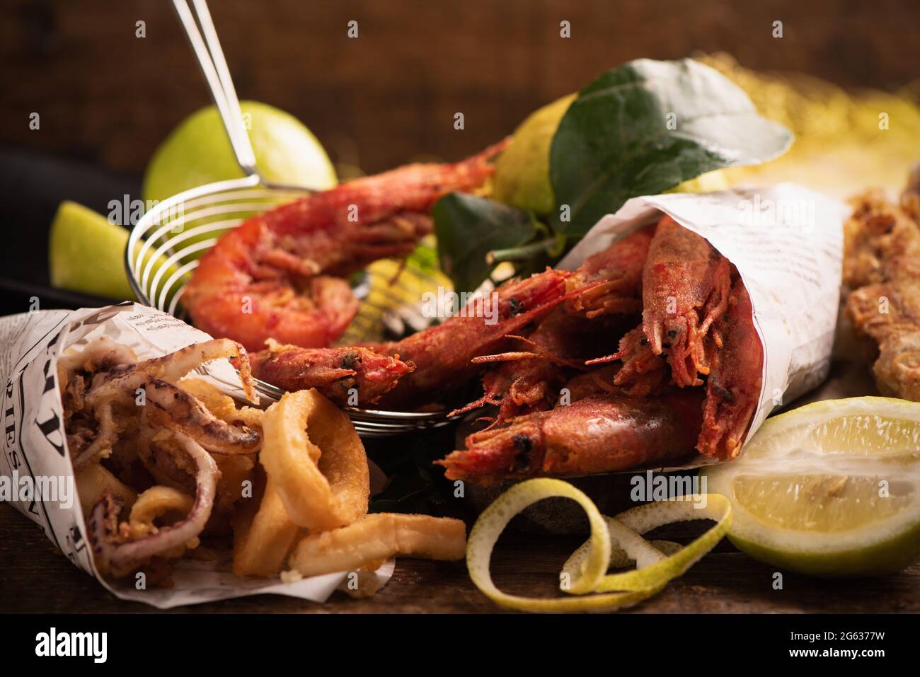 Fried mixed seafood with red prawns from Mazara. Street food concept ...