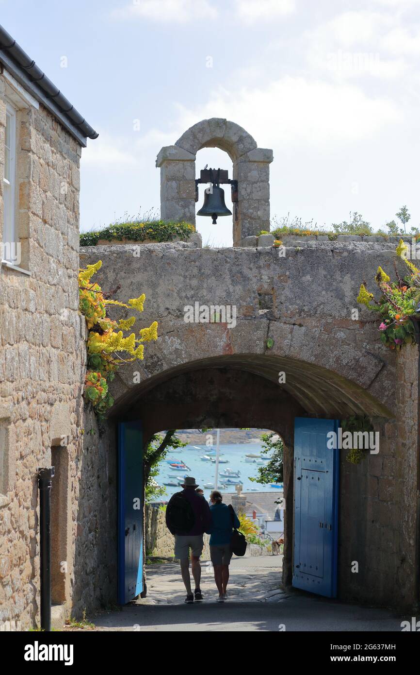 A couple passes the main gateway through the ancient castle wall at The ...