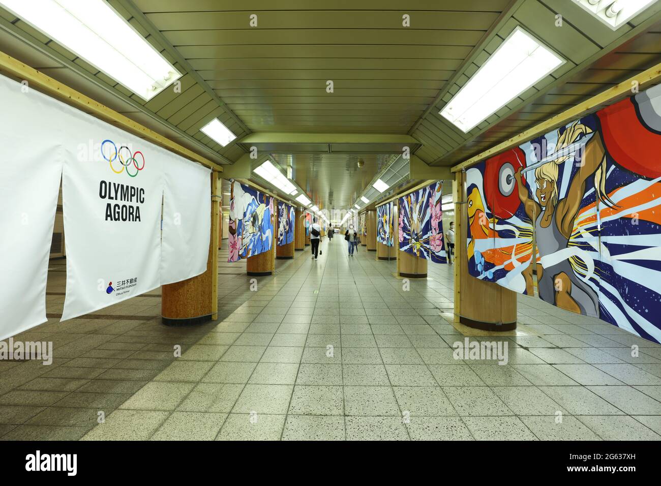 Tokyo, Japan. July 2, 2021: View of a sign promoting the "Olympic Agora ...