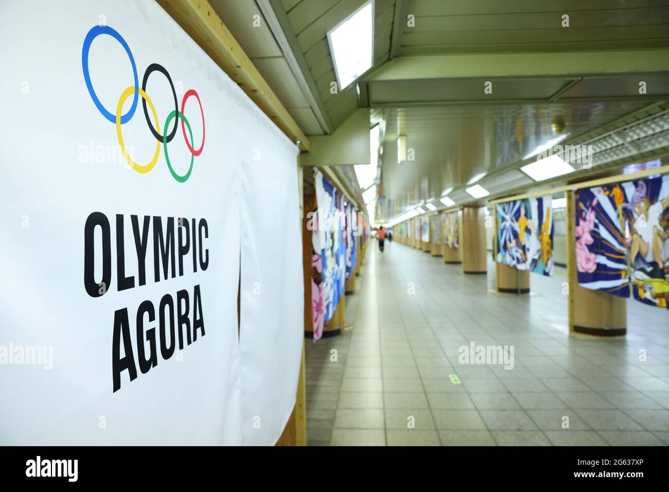 Tokyo, Japan. July 2, 2021: View of a sign promoting the "Olympic Agora ...