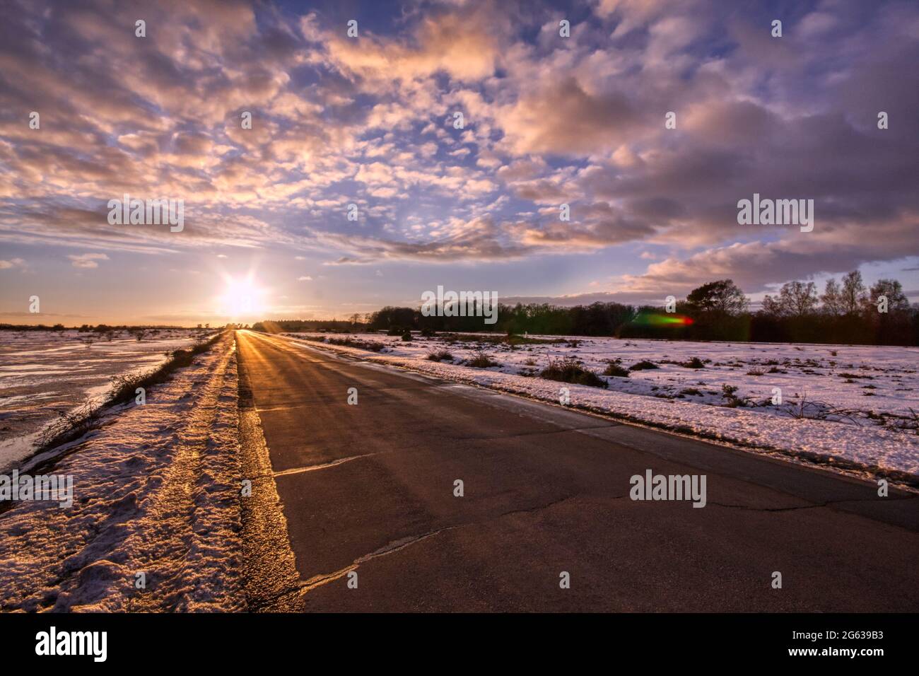 A Sunset in Snow, The New Forest Stock Photo - Alamy
