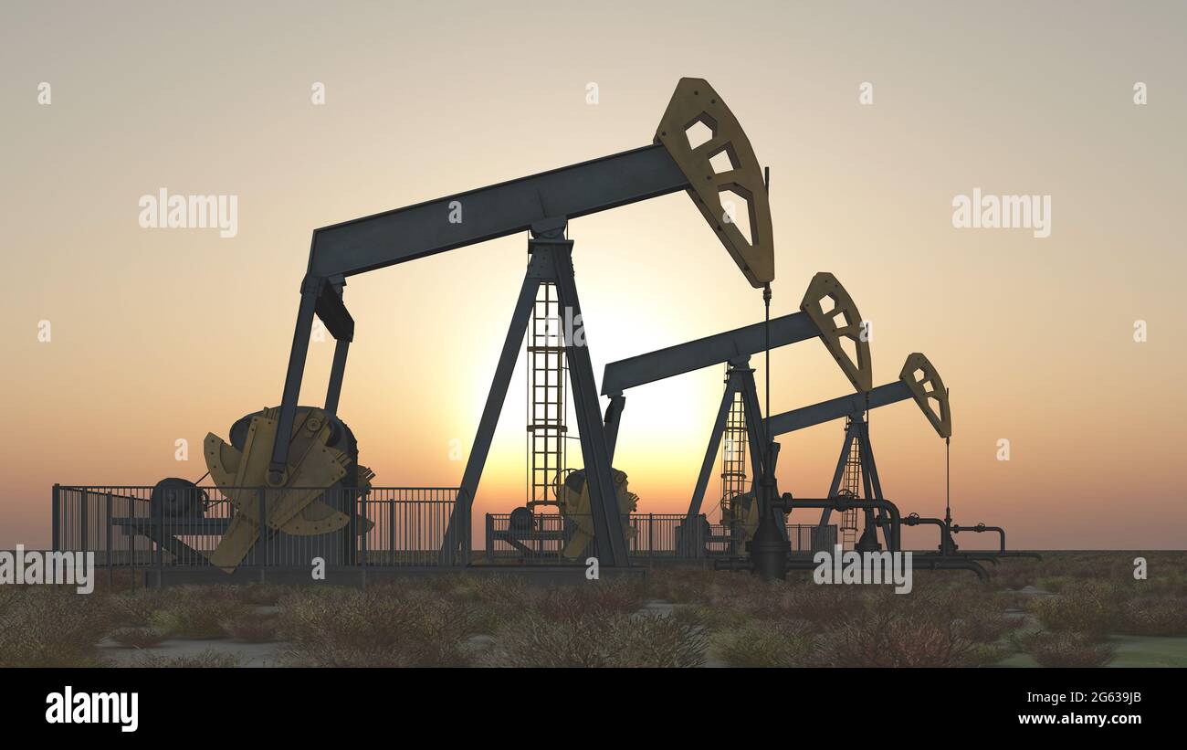 Oil pumps at sunset Stock Photo - Alamy