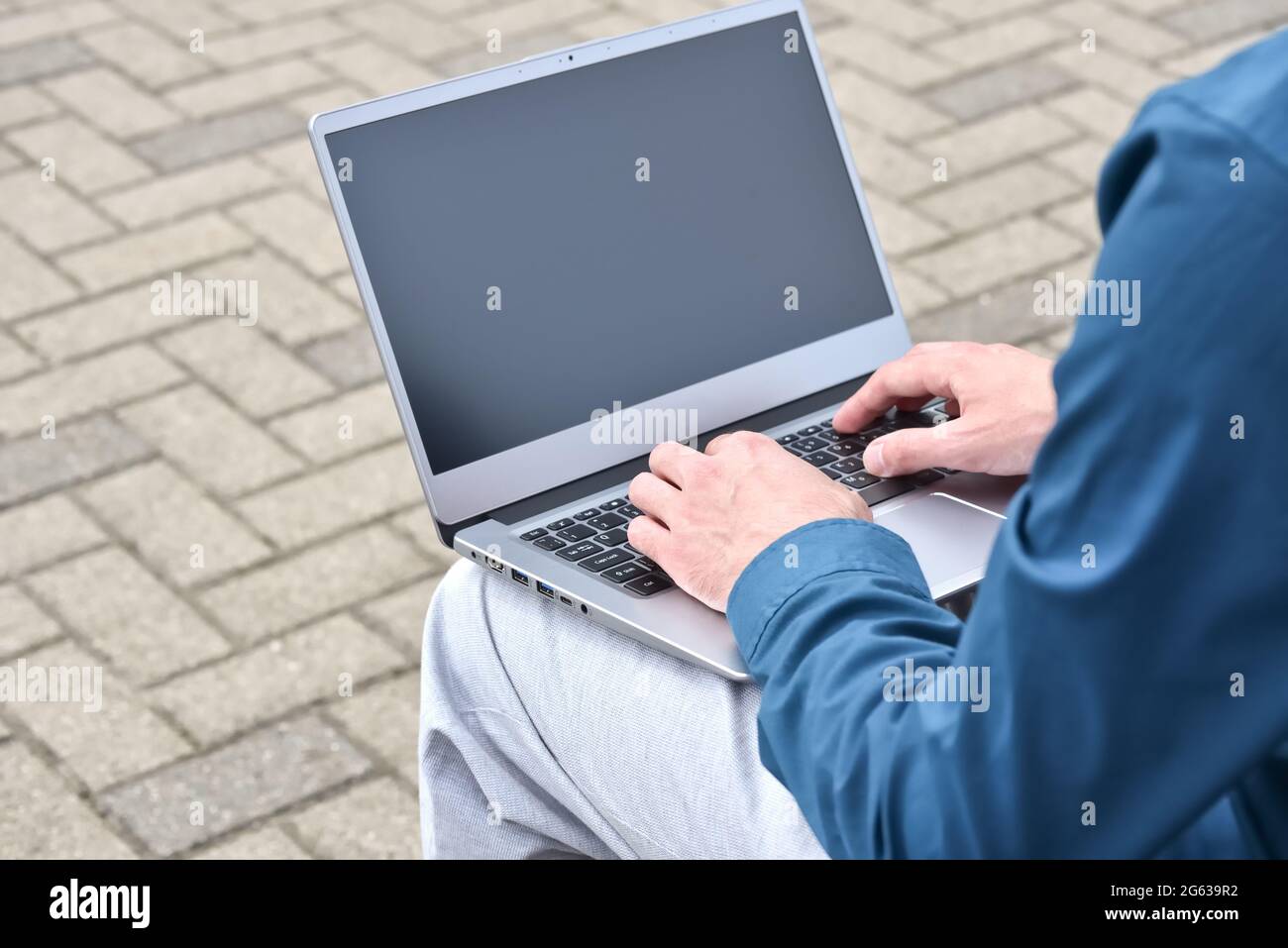 Laptop computer and man hands while working remotely on the computer ...