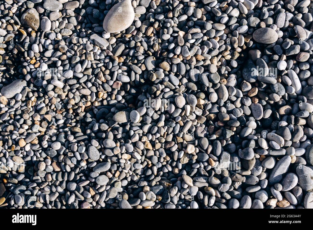 small stones pebbles at the sea beach background texture Stock Photo ...