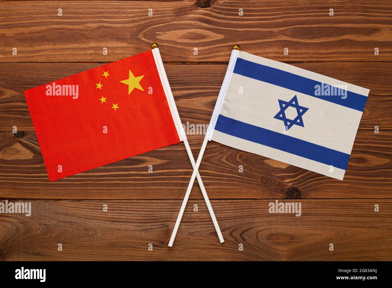 Flag of China and flag of Israel crossed with each other. The image ...