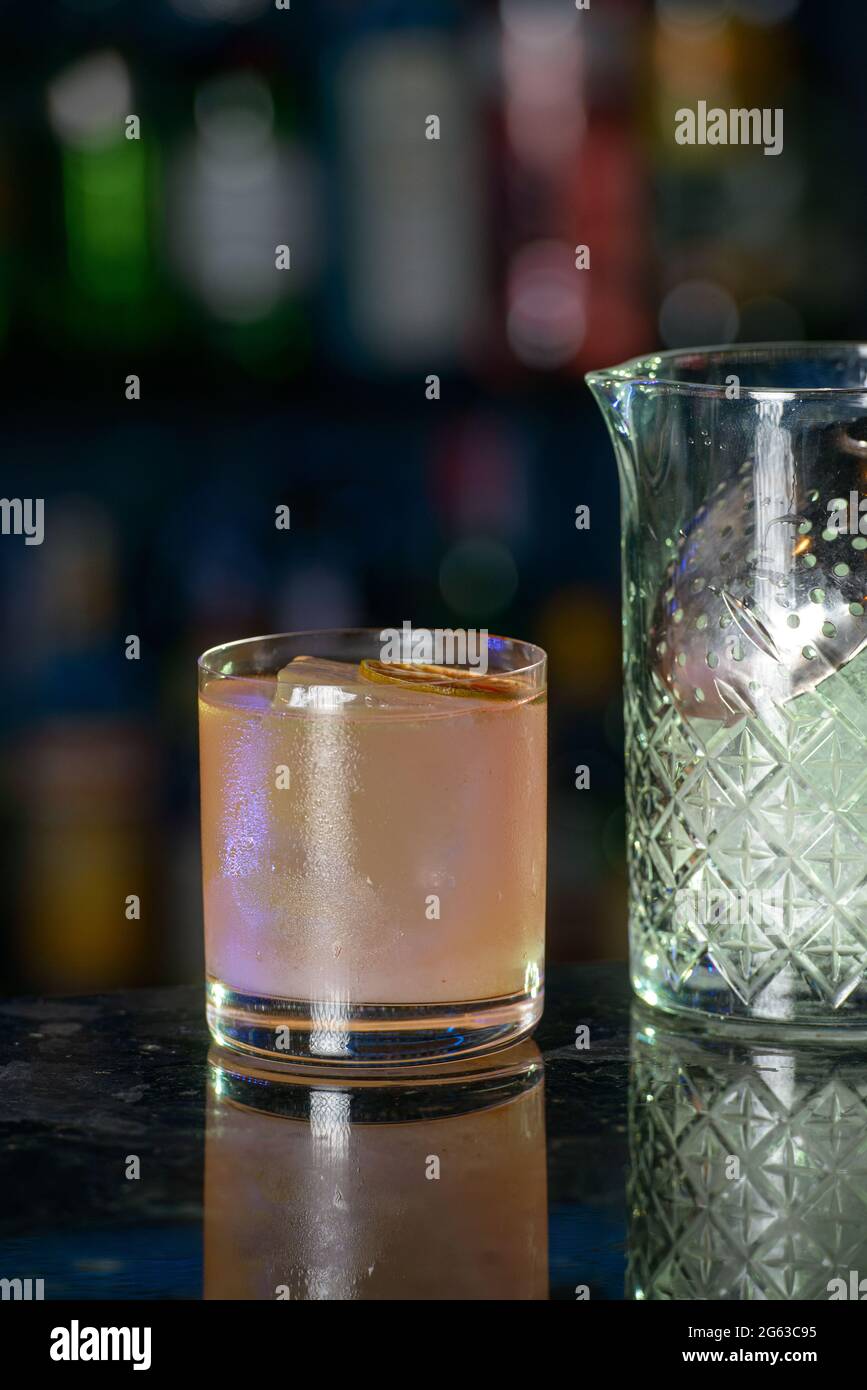 beige refreshing coctail on a bar desk Stock Photo - Alamy