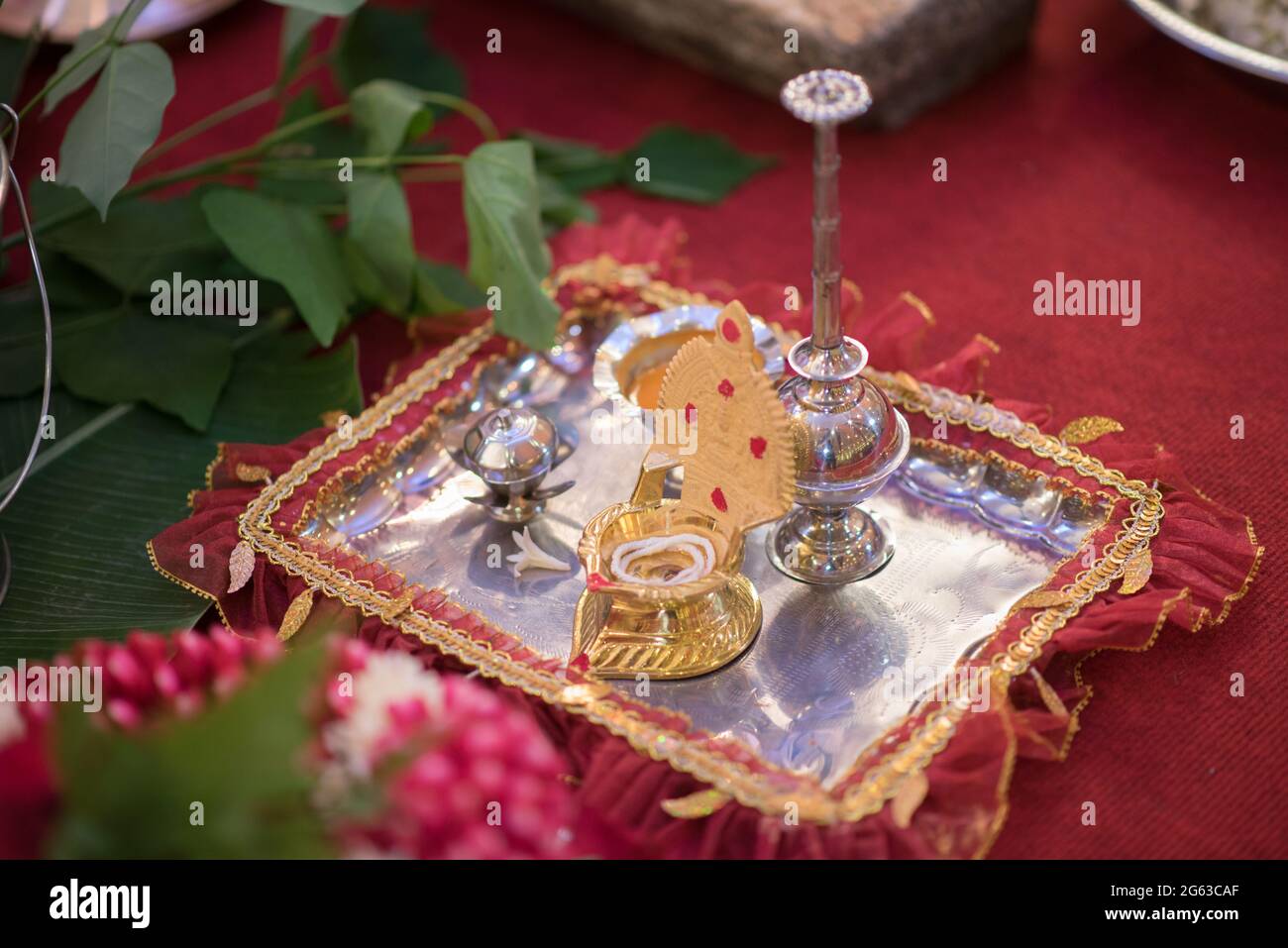 Brass lamp and other objects for a traditional Hindu wedding ritual ...