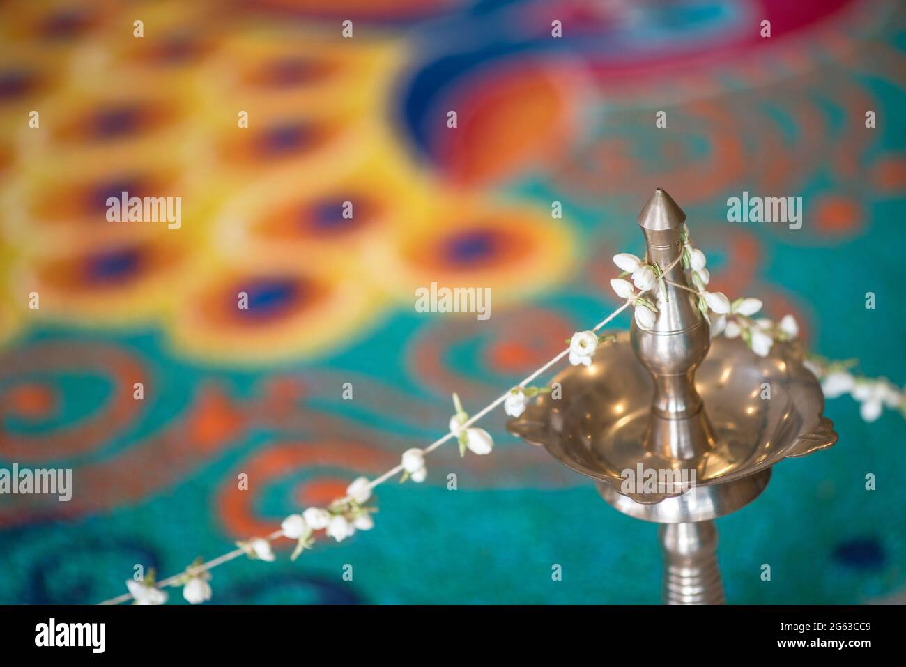 Traditional brass oil lamp during a Hindu wedding celebration Stock ...