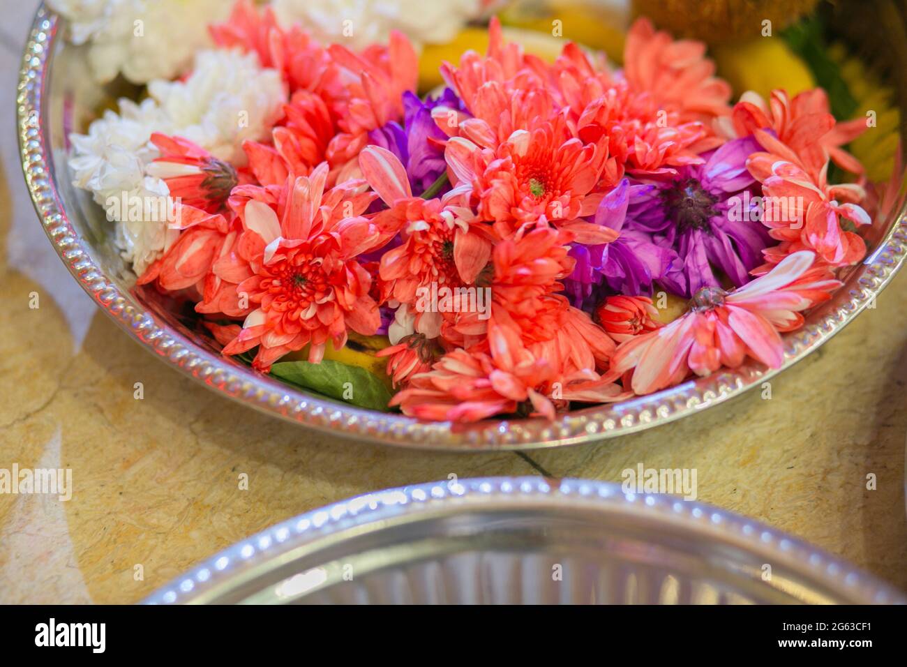 Traditional flower plate for a Hindu wedding ritual Stock Photo - Alamy