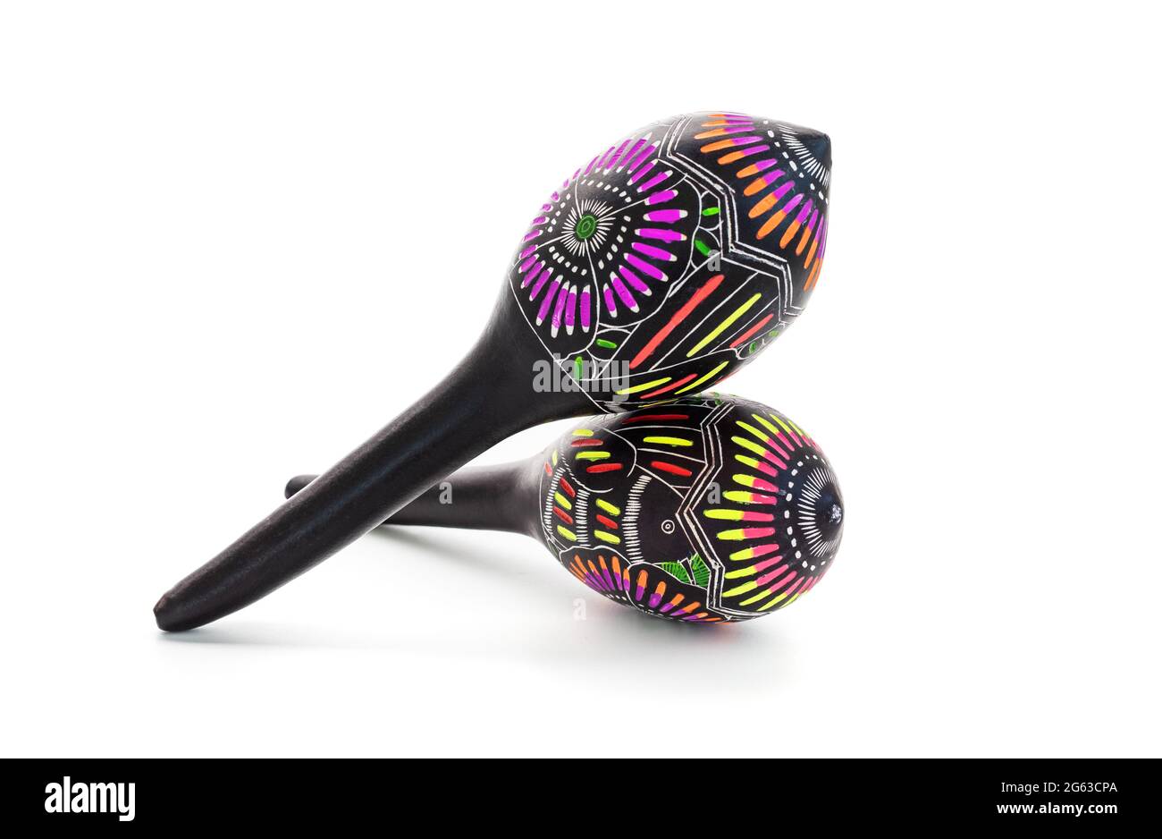 Pair of colorful maracas on white background Stock Photo - Alamy