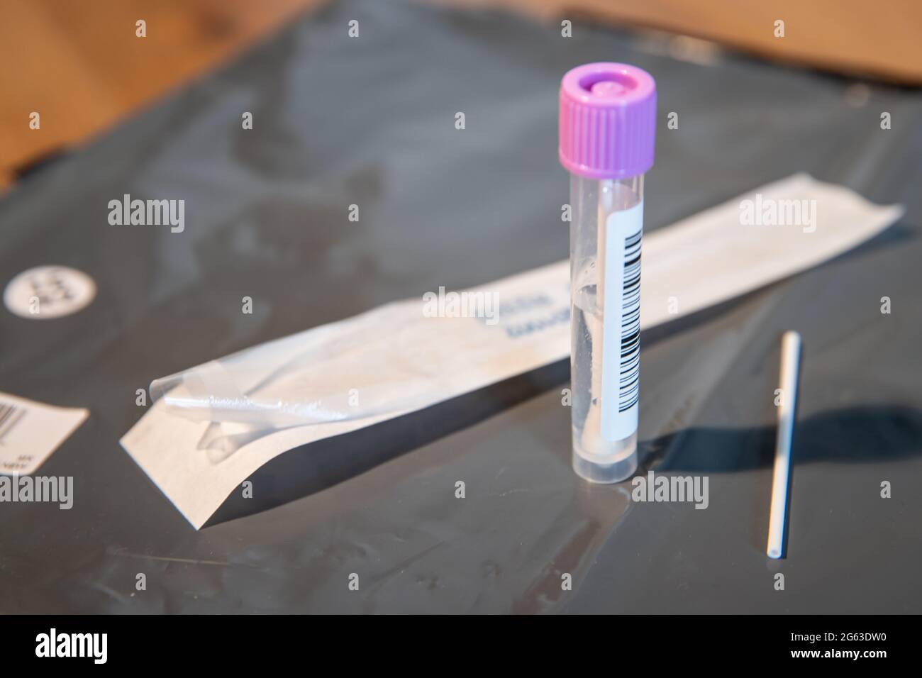 Completed NHS-issued covid PCR home test ready to be sent back to the ...