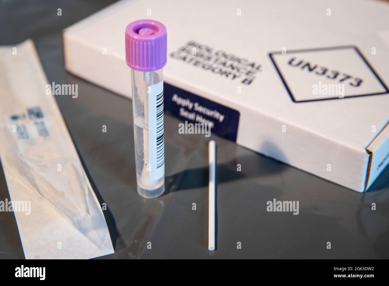 Completed NHS-issued covid PCR home test ready to be sent back to the ...