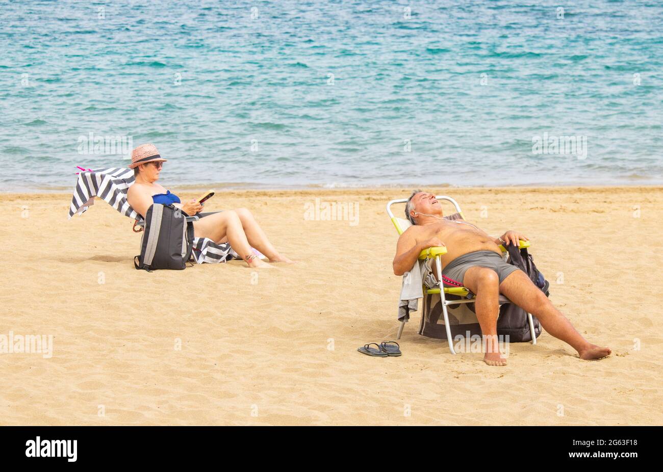 Las Palmas, Gran Canaria, Canary Islands, Spain. 2nd July, 2021. Locals and a few tourists ...