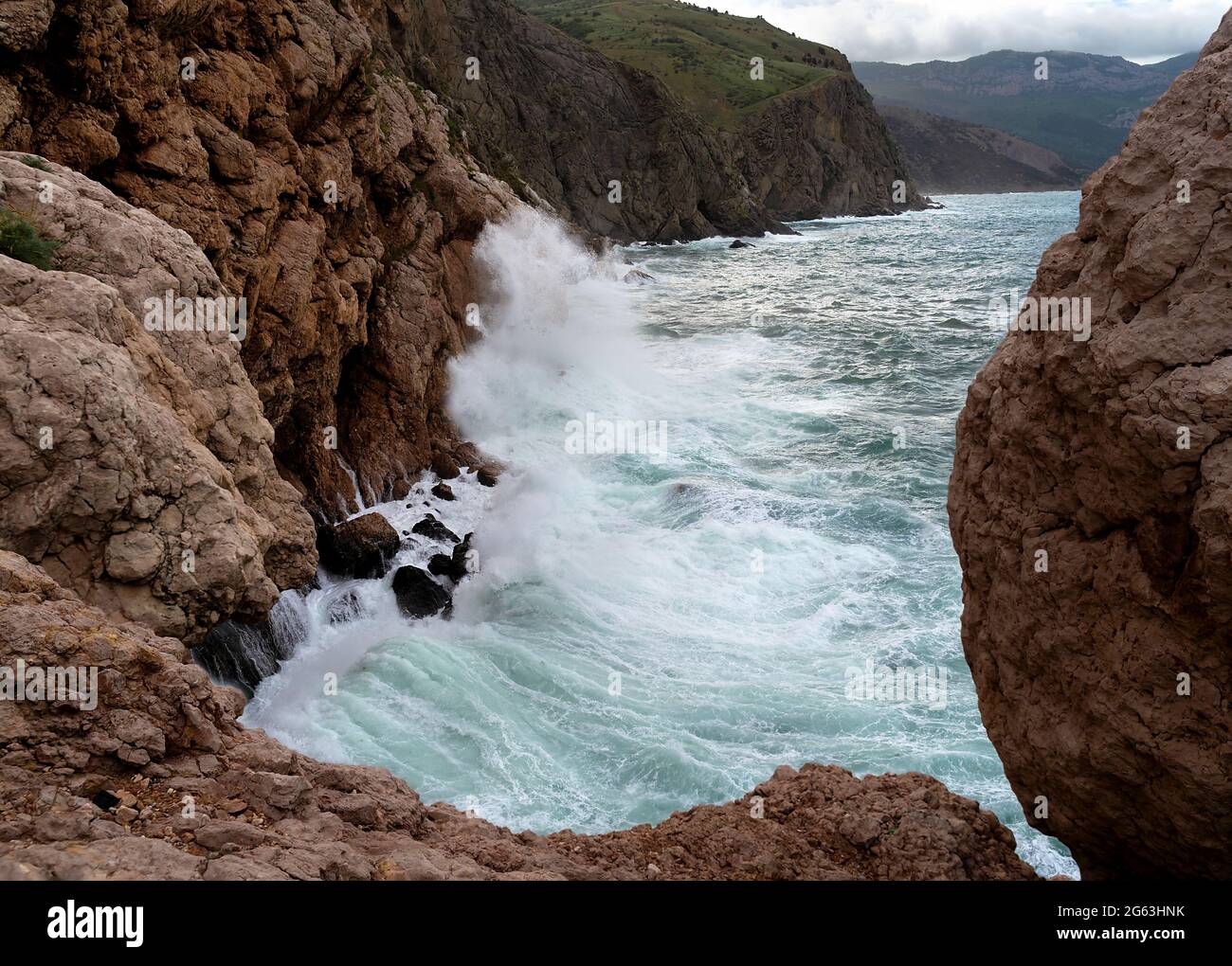 Beautiful seascape with turquoise storming water and high cliffs. Great ...