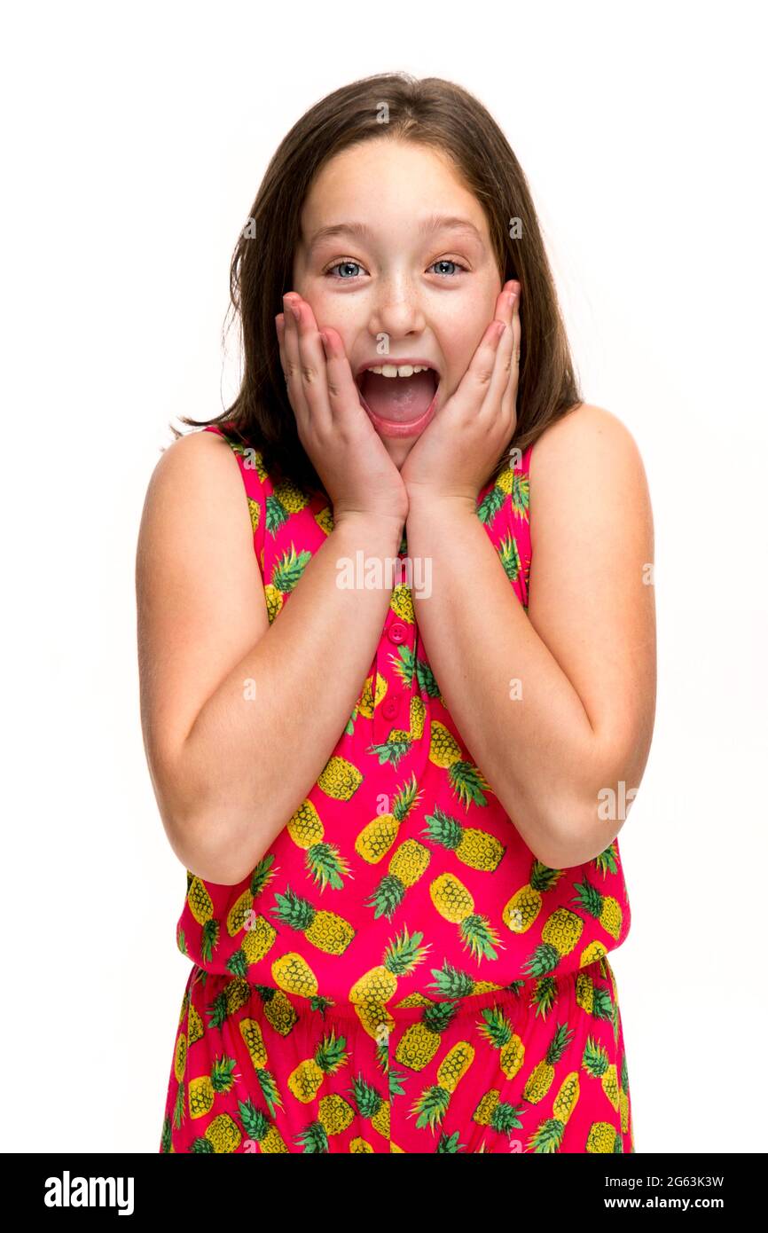 A tween girl with a surprised expression Stock Photo - Alamy
