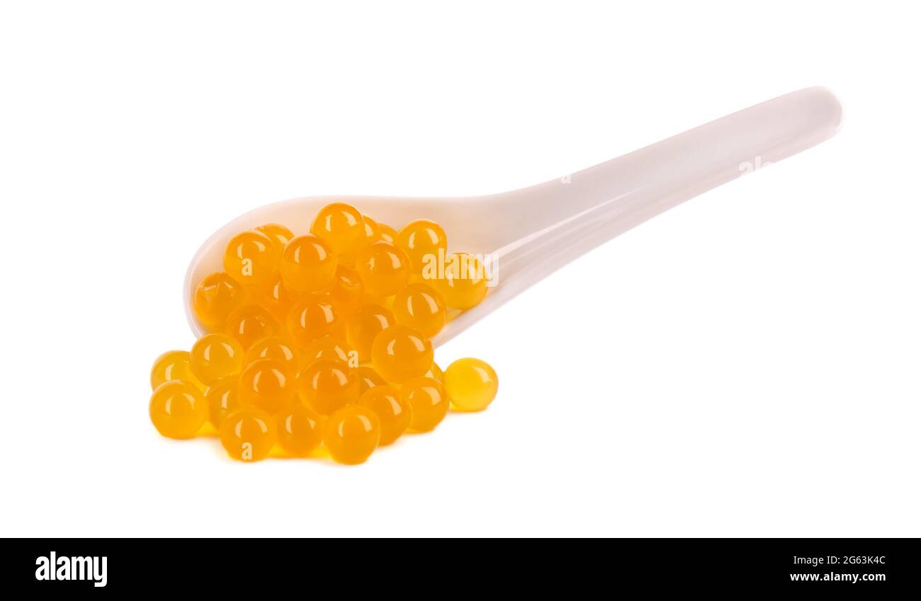 Yellow tapioca pearls for bubble tea isolated on white background ...