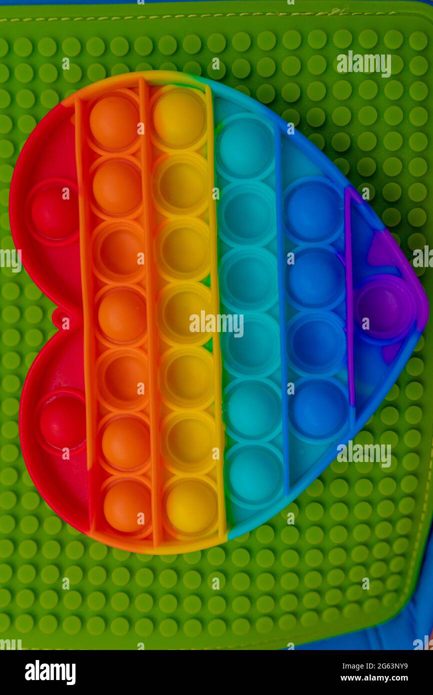 colorful kids pop it antistress toy for kids Stock Photo - Alamy