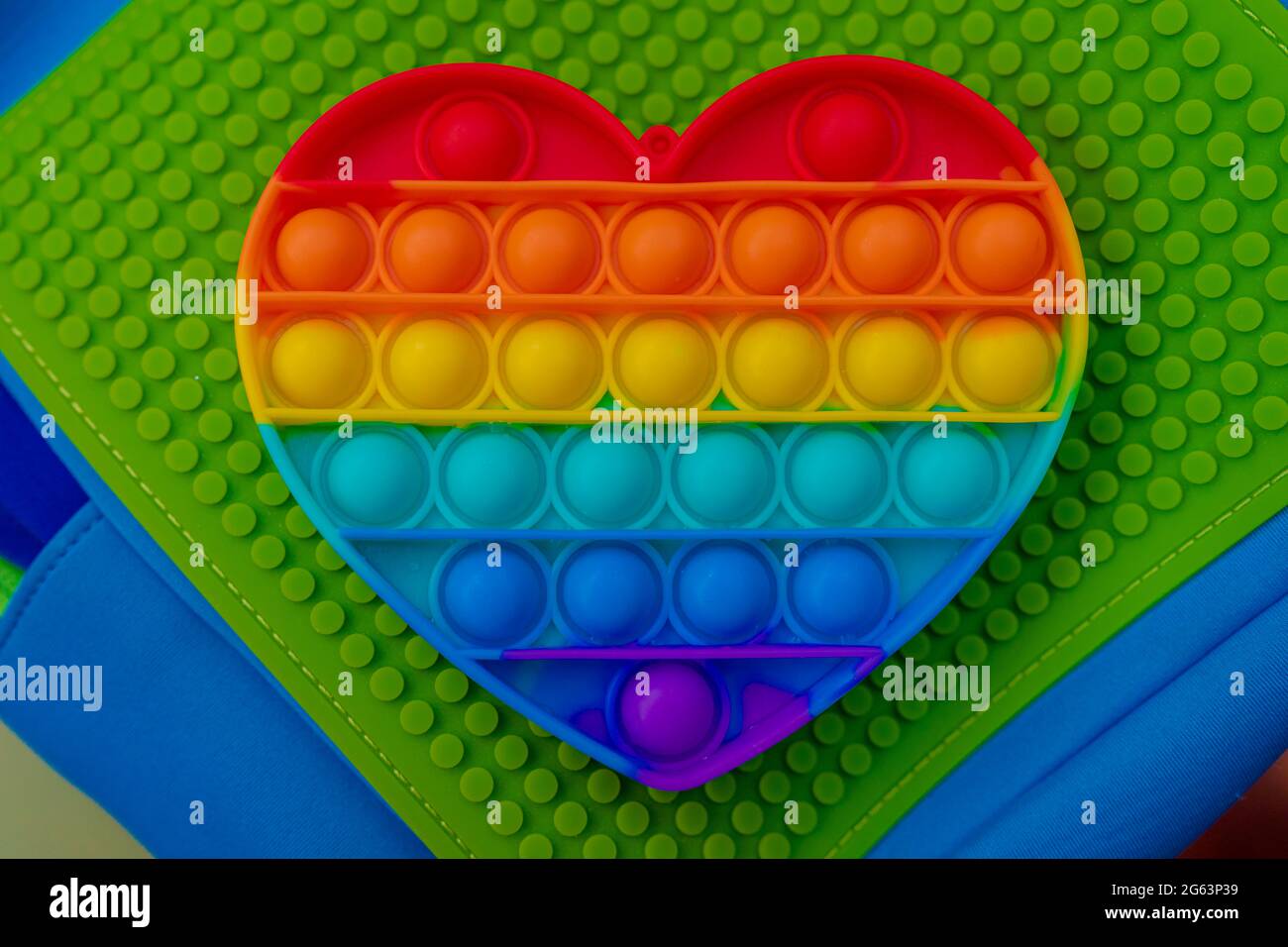 colorful kids pop it antistress toy for kids Stock Photo - Alamy