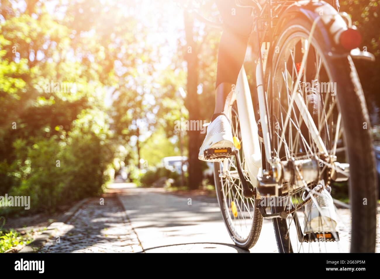 Young black woman riding bicycle hi-res stock photography and images ...