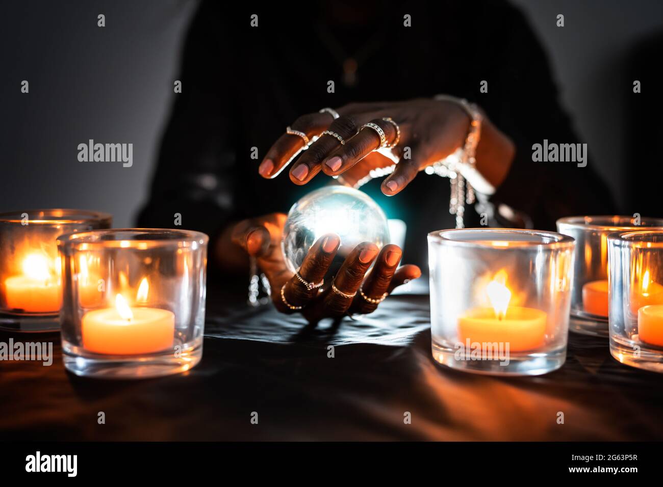 Fortune Teller Predicting Future Using Crystal Ball Stock Photo - Alamy