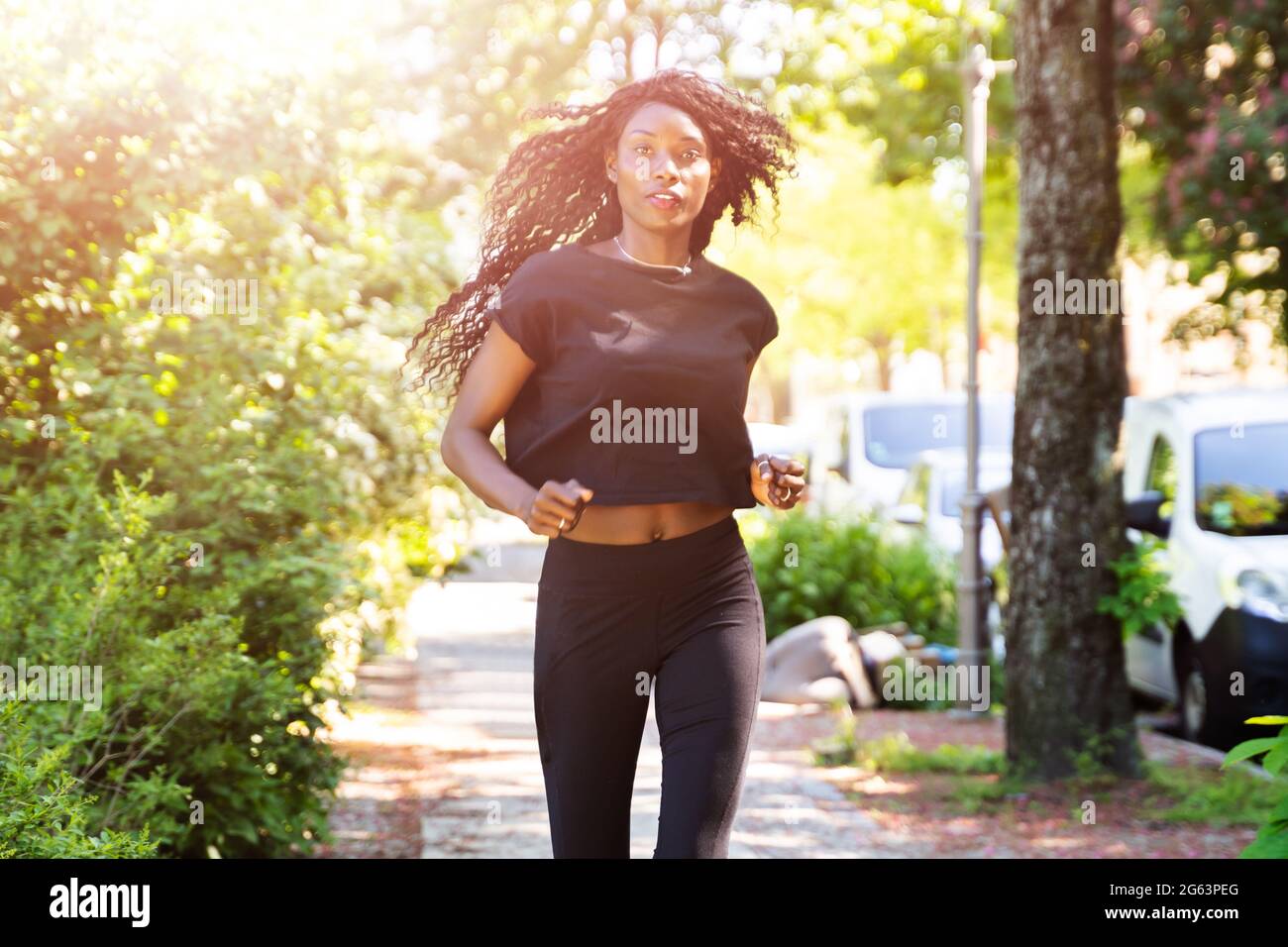 Black woman runner hi-res stock photography and images - Alamy