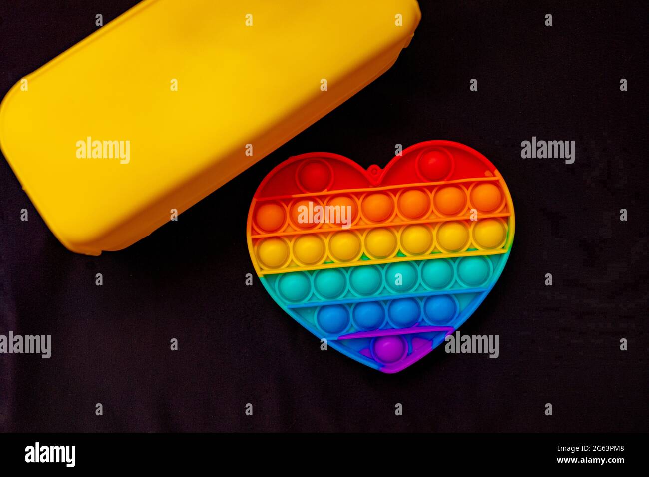 colorful kids pop it antistress toy for kids Stock Photo - Alamy