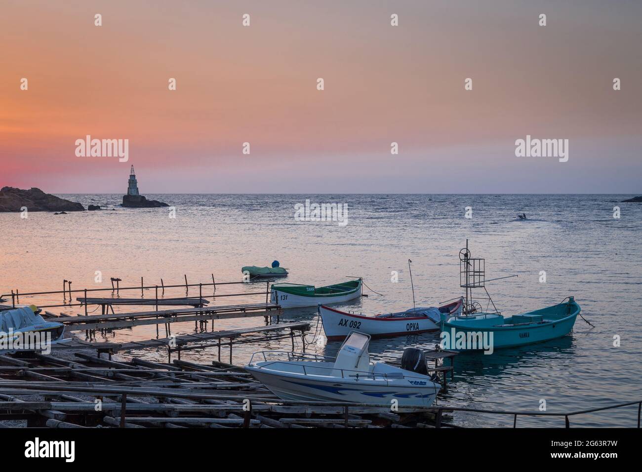 Ahtopol - September 10: Sunrise at the beach with fishing pier, rocks ...