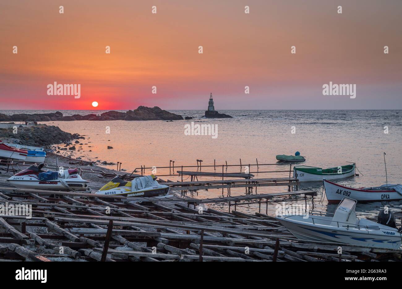 Ahtopol - September 10: Sunrise at the beach with fishing pier, rocks ...