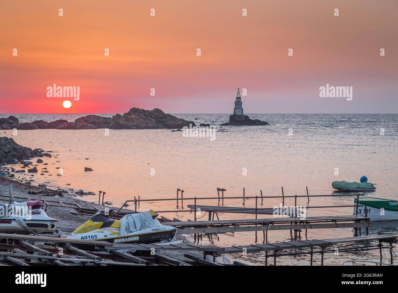 Ahtopol - September 10: Sunrise at the beach with fishing pier, rocks ...