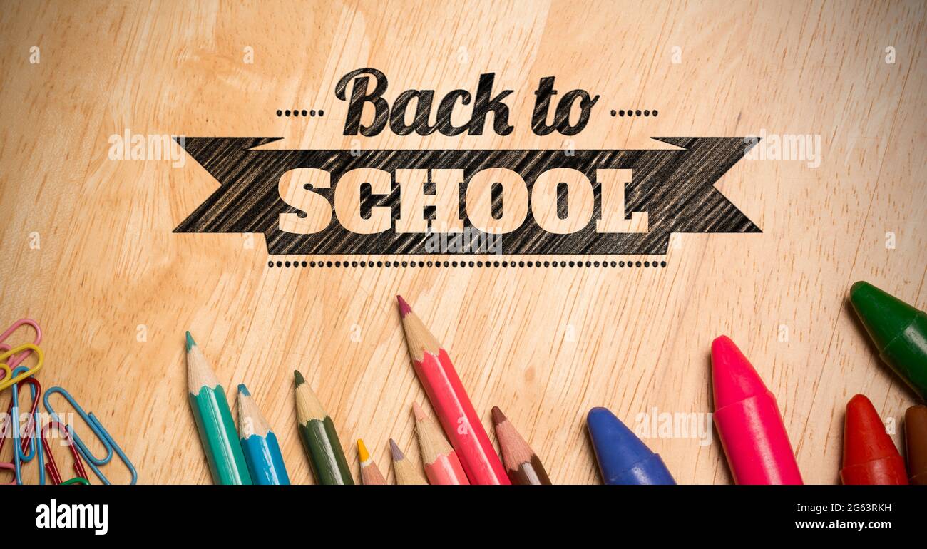 Composition of back to school text and school items Stock Photo - Alamy